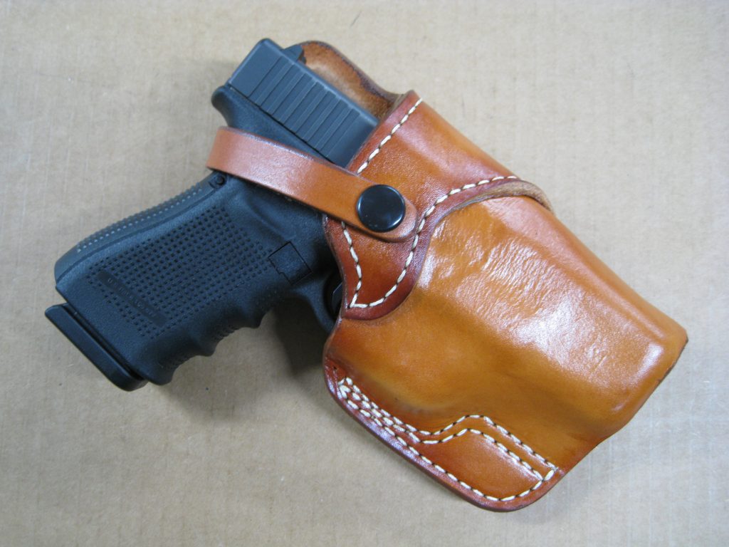 Cross Draw Carry Holster With Safety Strap – Azula Gun Holsters